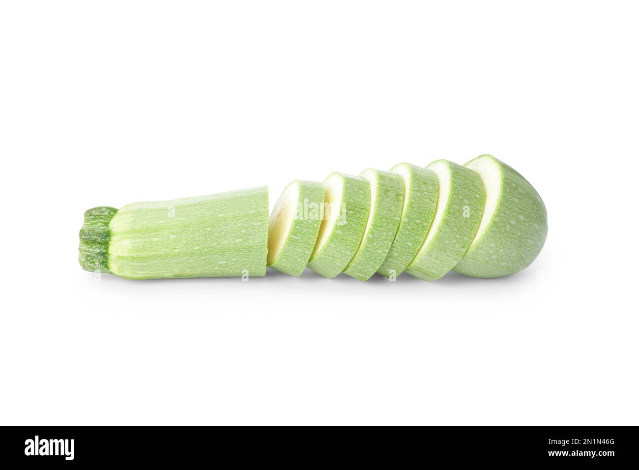 Cut green ripe zucchini isolated on white Stock Photo - Alamy