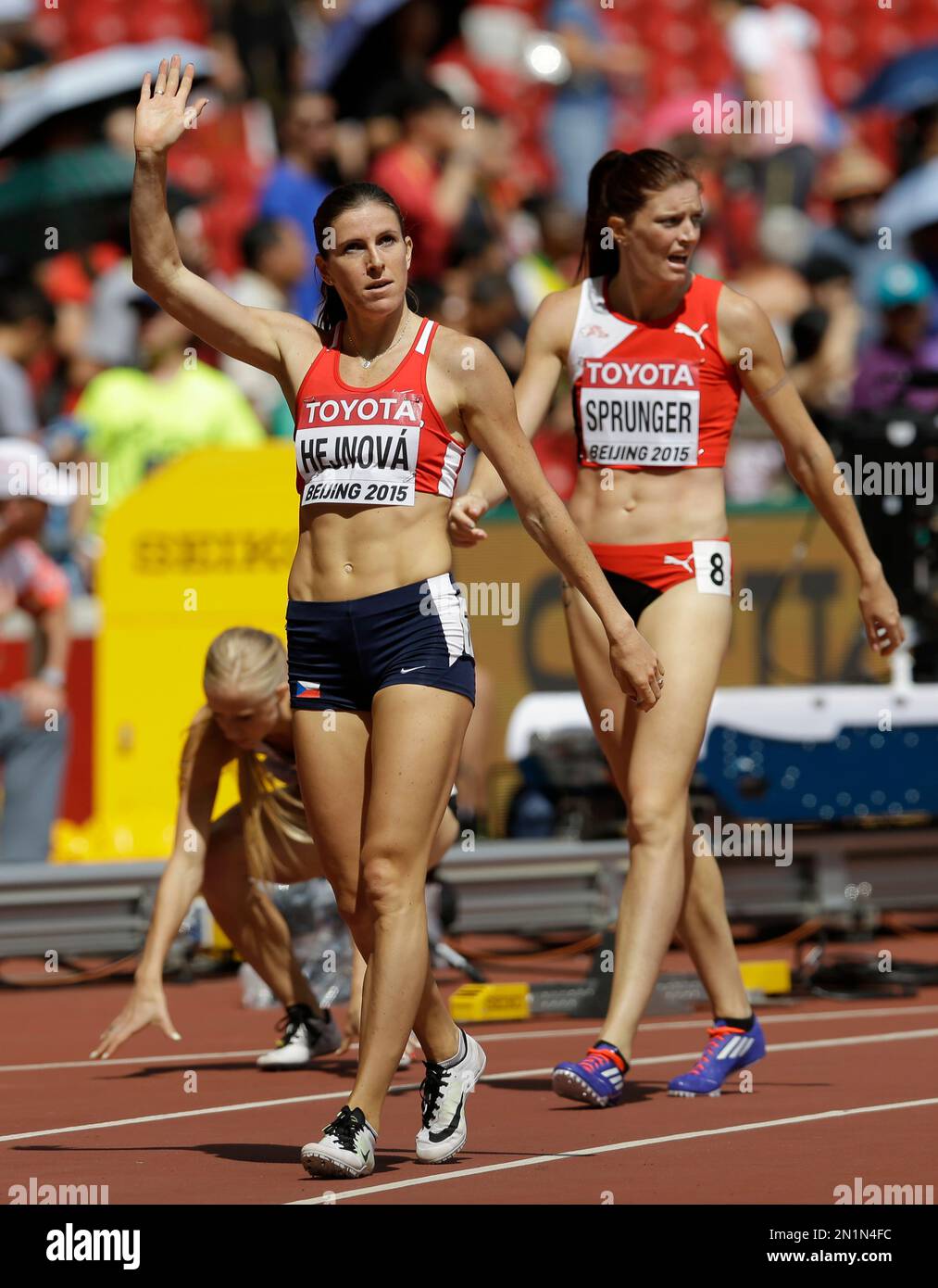Czech Republic's Zuzana Hejnova waves after competing in the women's ...
