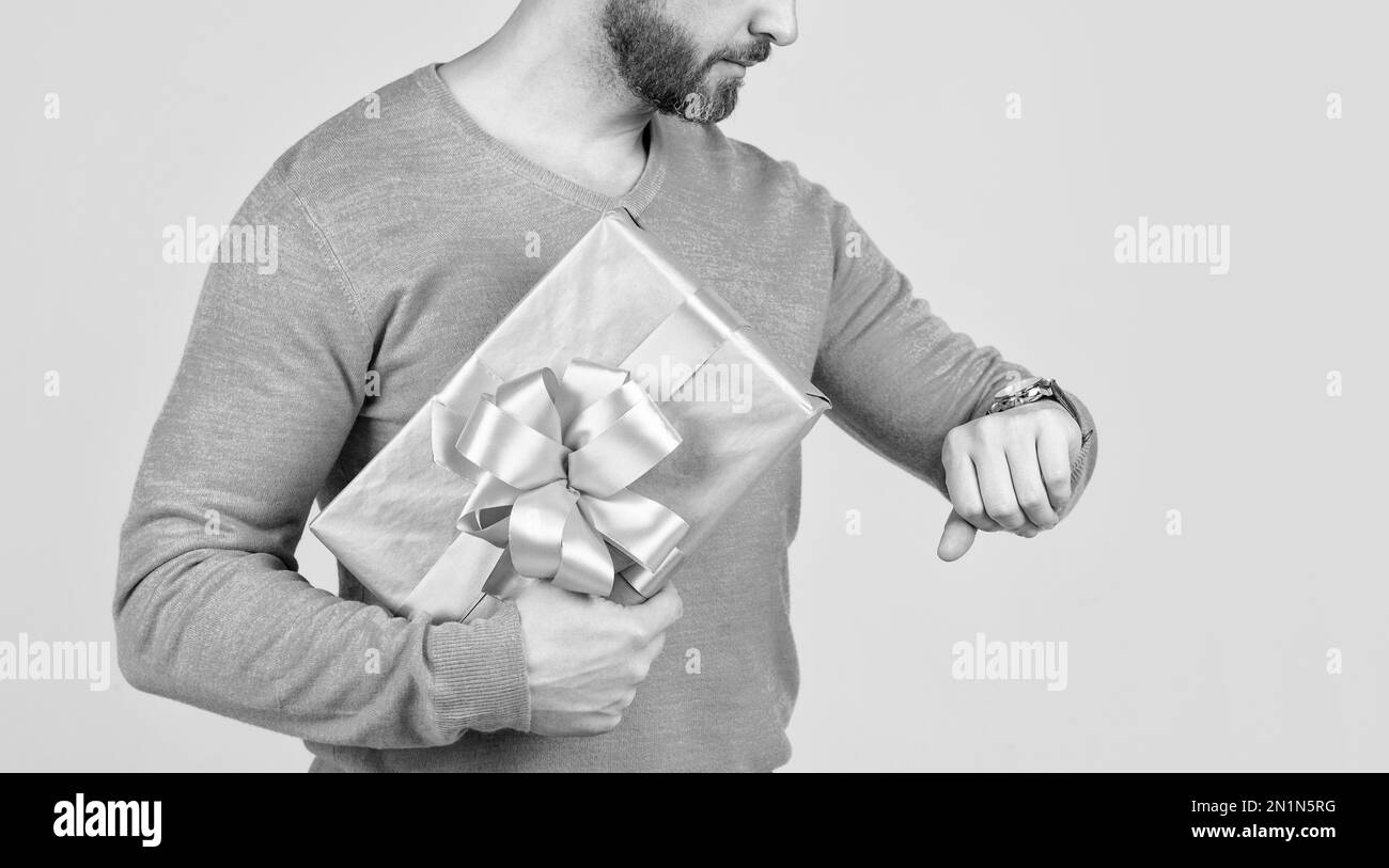 Man holding gift on Black and White Stock Photos & Images - Alamy