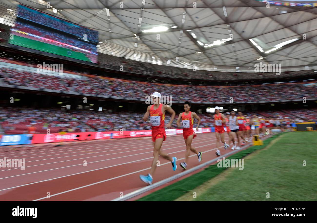 China's Chen Ding leads at the start of the men's 20k race walk final ...