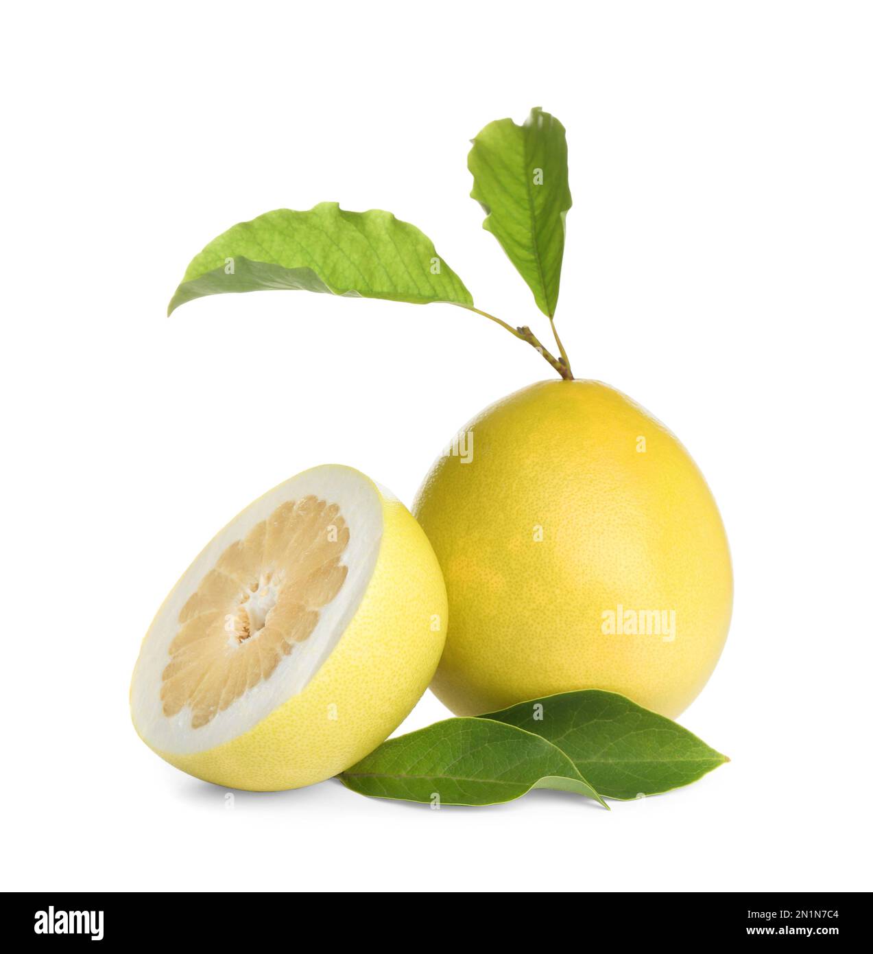 Fresh cut and whole pomelo fruits isolated on white Stock Photo - Alamy