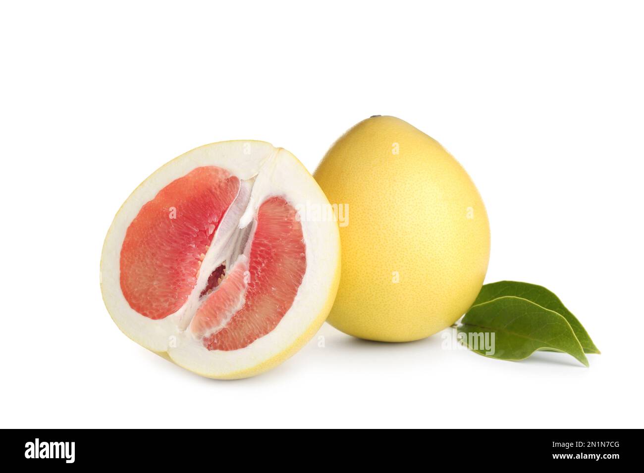 Fresh cut and whole pomelo fruits isolated on white Stock Photo - Alamy