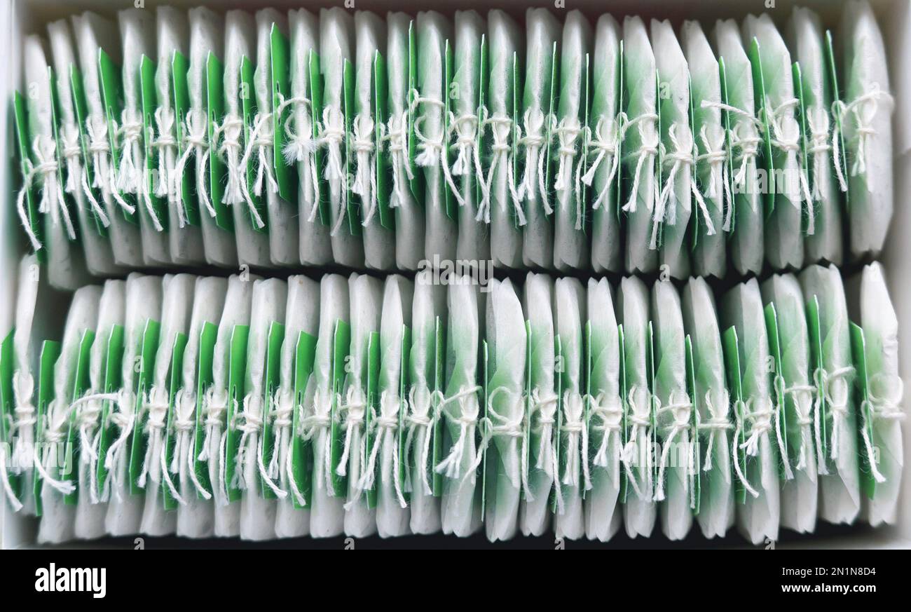 Row of tea bags hi-res stock photography and images - Alamy