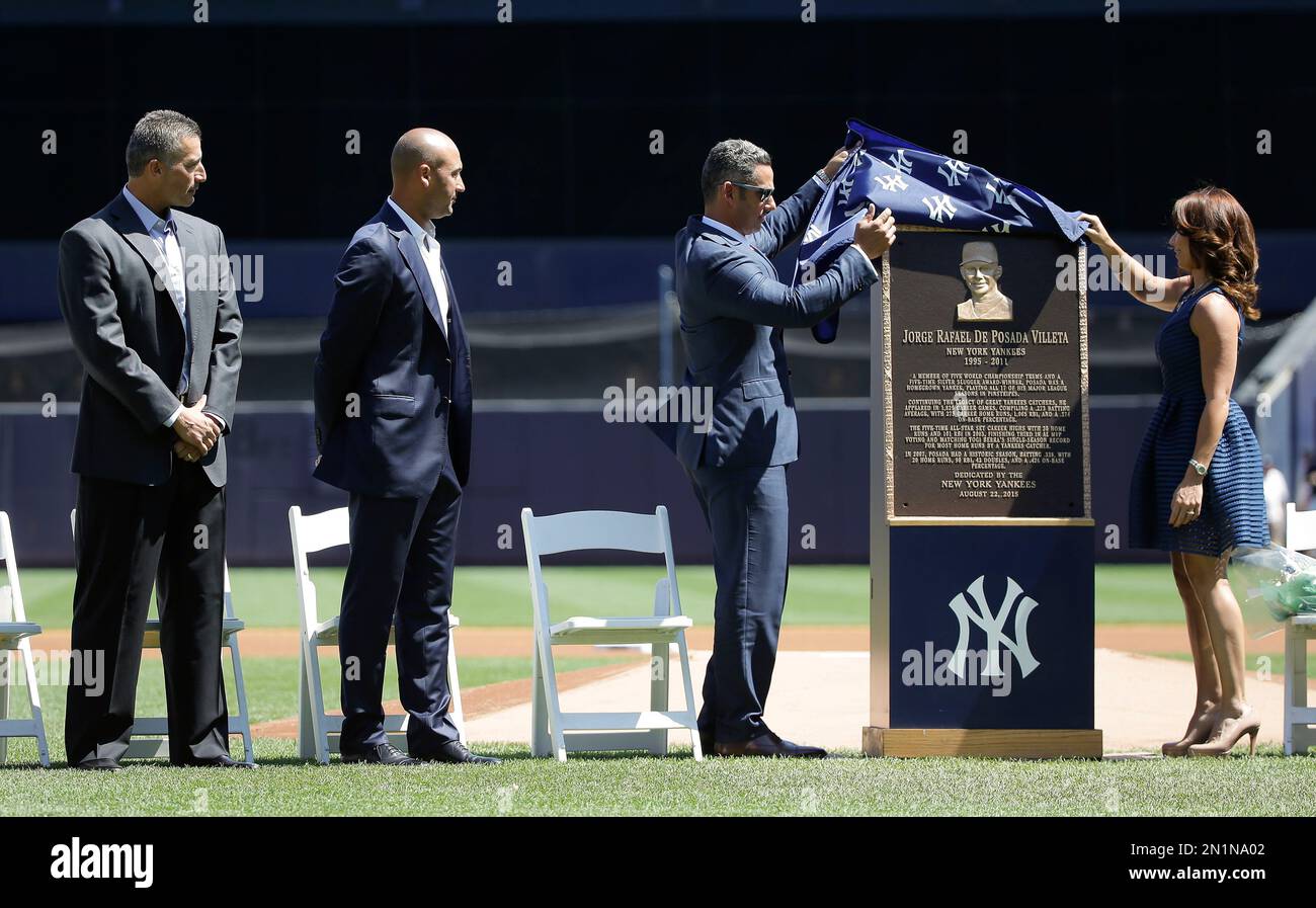 Former New York Yankees catcher Jorge Posada, third from left, and his ...