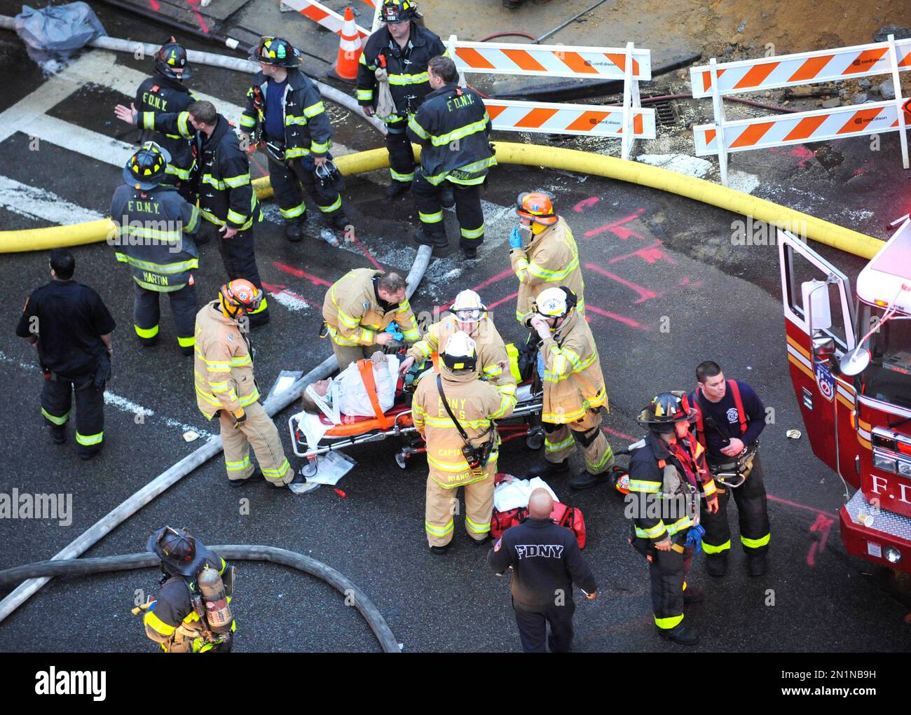 FILE - In this March 26, 2015 file photos firefighters work at the ...