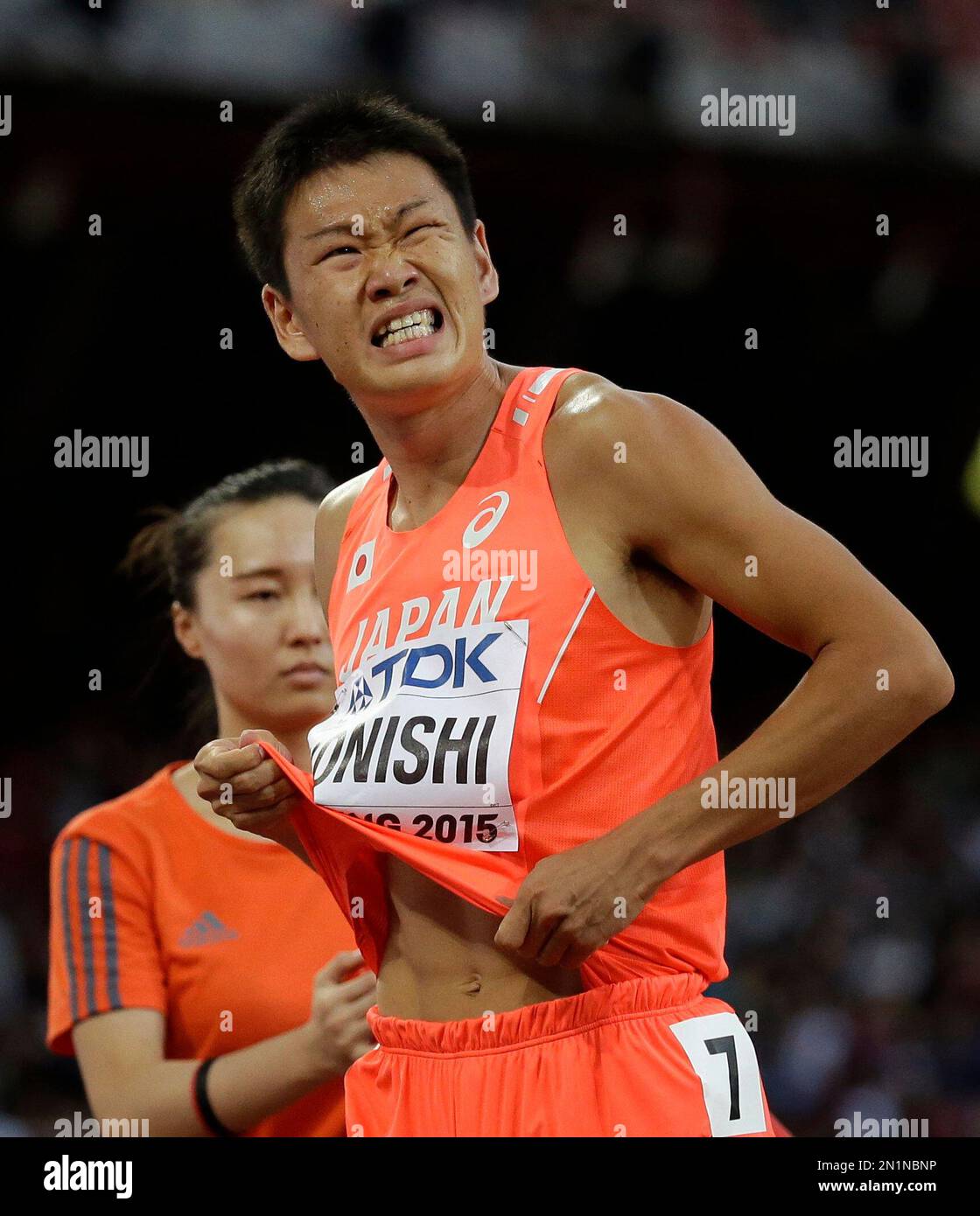 Japan's Yuta Konishi looks at his time from his men’s round one heat of ...