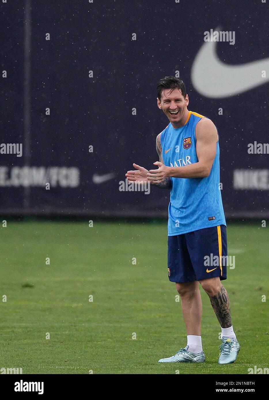 FC Barcelona's Lionel Messi, from Argentina, smiles during a training ...