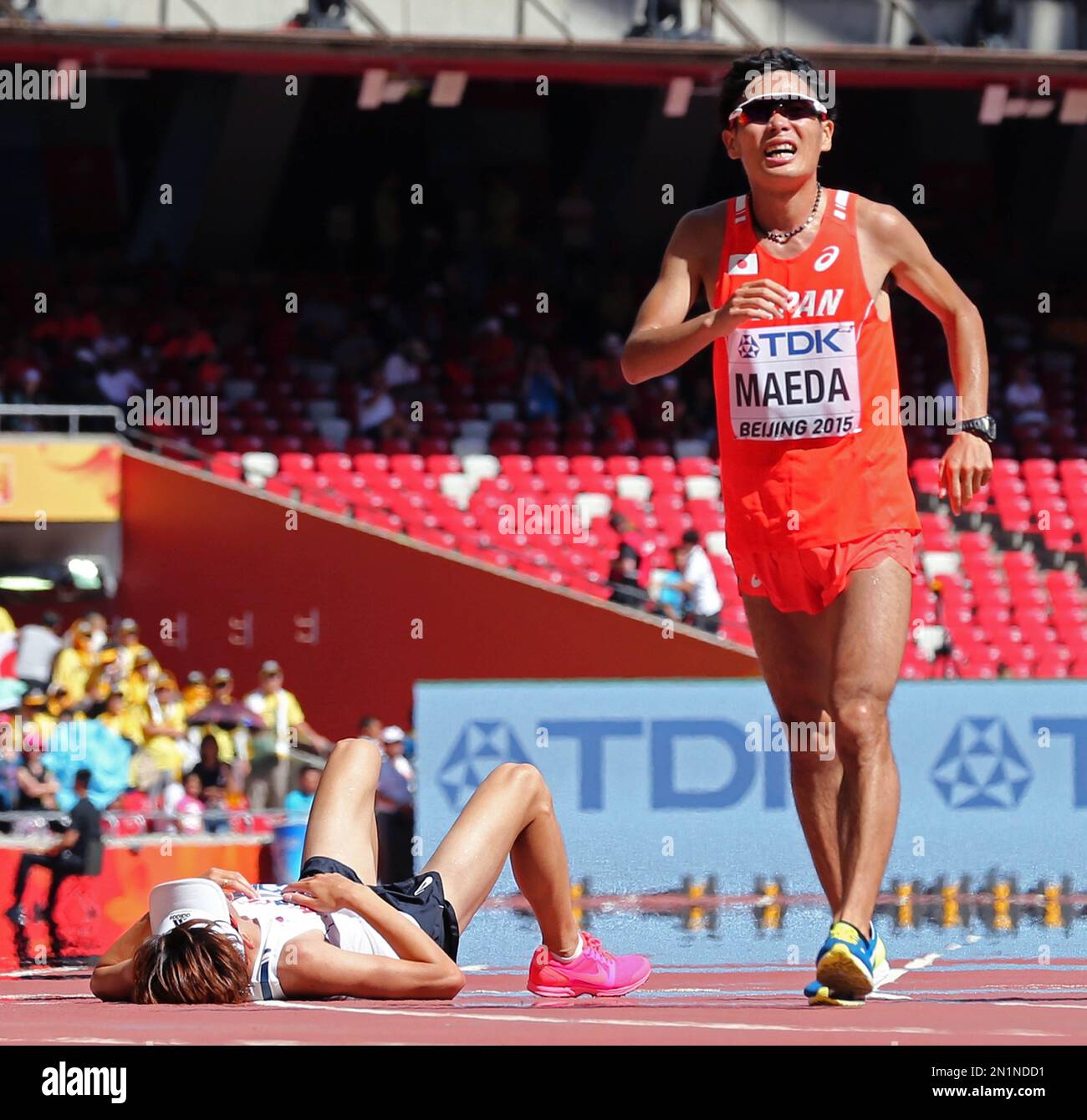 Japan's Kazuhiro Maeda, right, moves past South Korea's Noh Si-hwan in ...