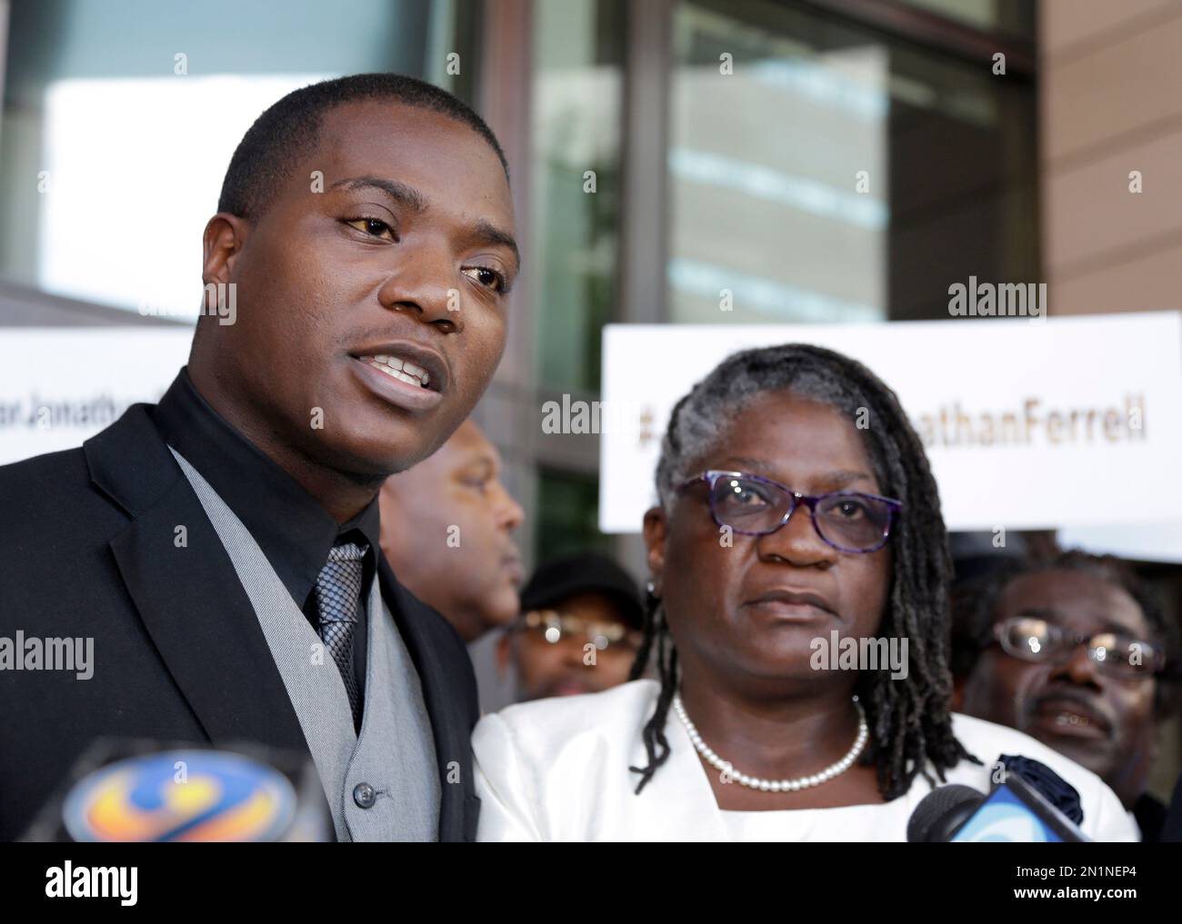 Jonathan Ferrell's brother Willie Ferrell, left, and his mother ...