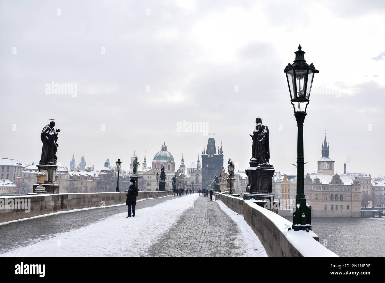 Charles Bridge with its statuette, Lesser Town Bridge Tower and the ...