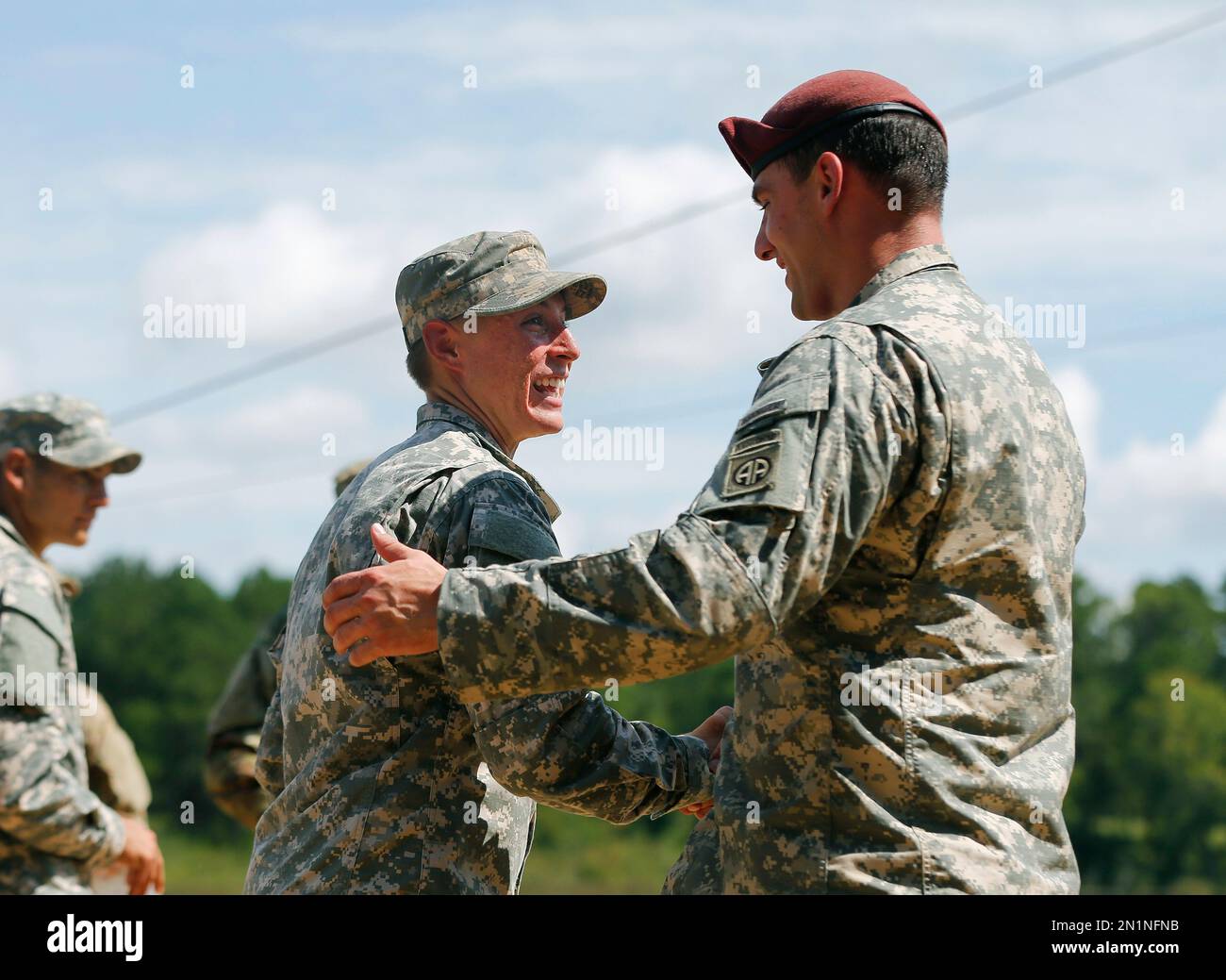 U.S. Army First Lt. Shaye Haver, left, is congratulated by an ...