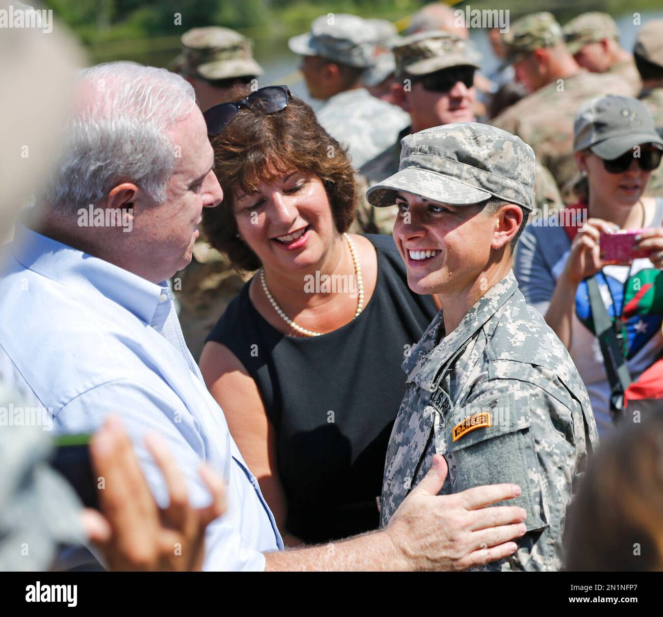 U.S. Army First Lt. Shaye Haver, right, smiles after receiving her ...