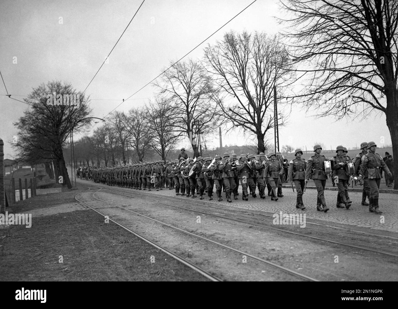 A German machine gun battalion marching along the frontier road, which ...