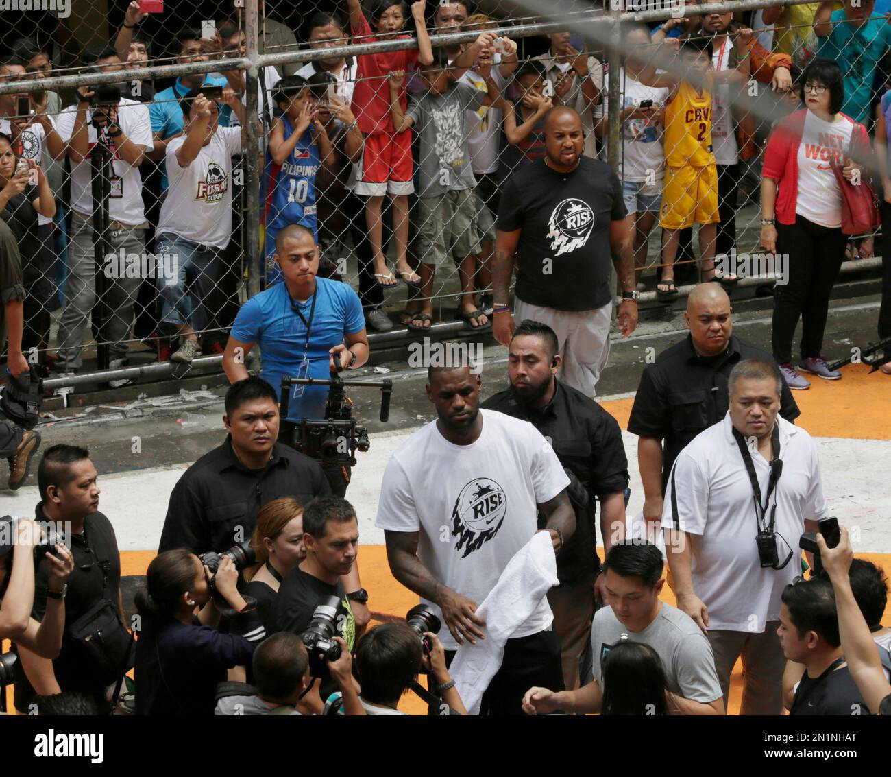 NBA basketball player LeBron James, center, of the Cleveland Cavaliers ...