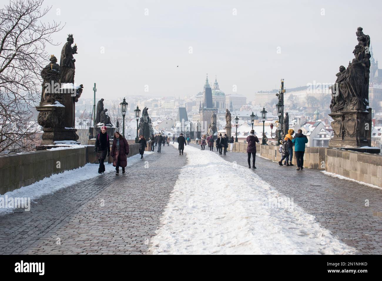 Charles Bridge with its statuette, Lesser Town Bridge Tower and the ...