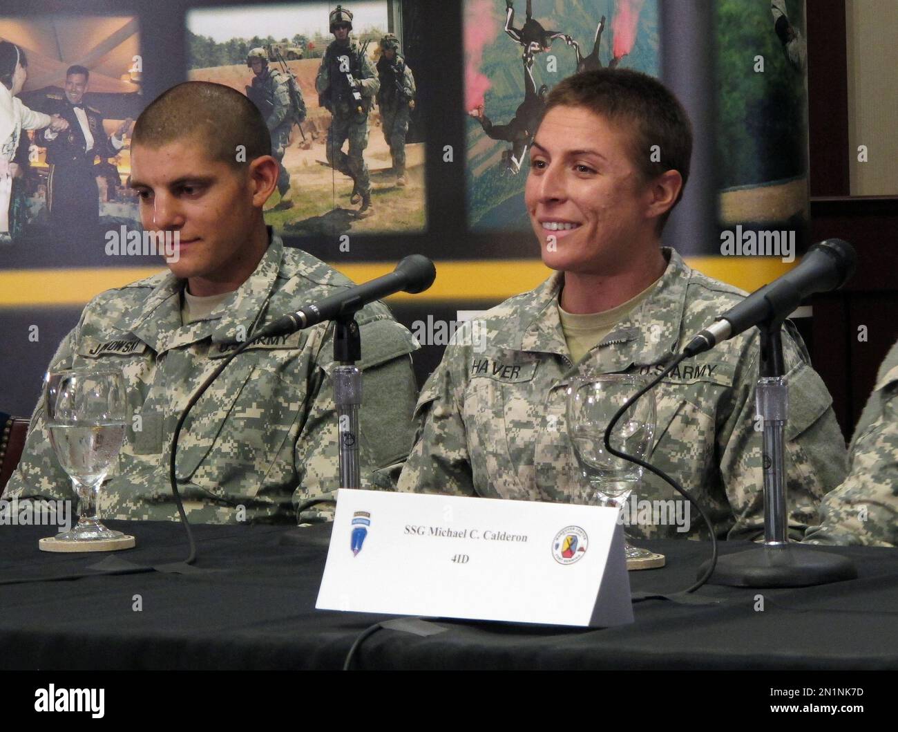U.S. Army Army 1st Lt. Shaye Haver, right, speaks with reporters ...