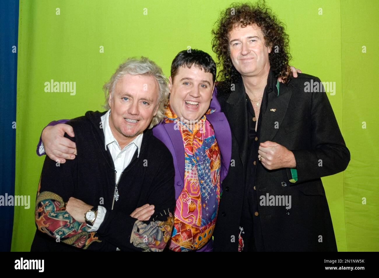 Queen's Brian May and Roger Taylor photographed with Peter Kay during ...