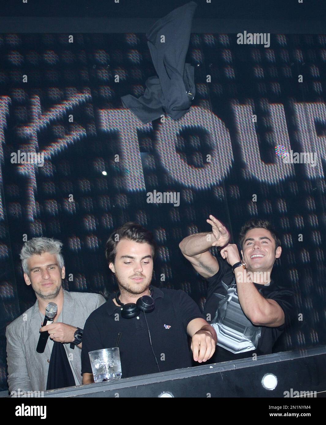 Director Max Joseph, left, DJ Pyramid, center, and actor Zac Efron ...