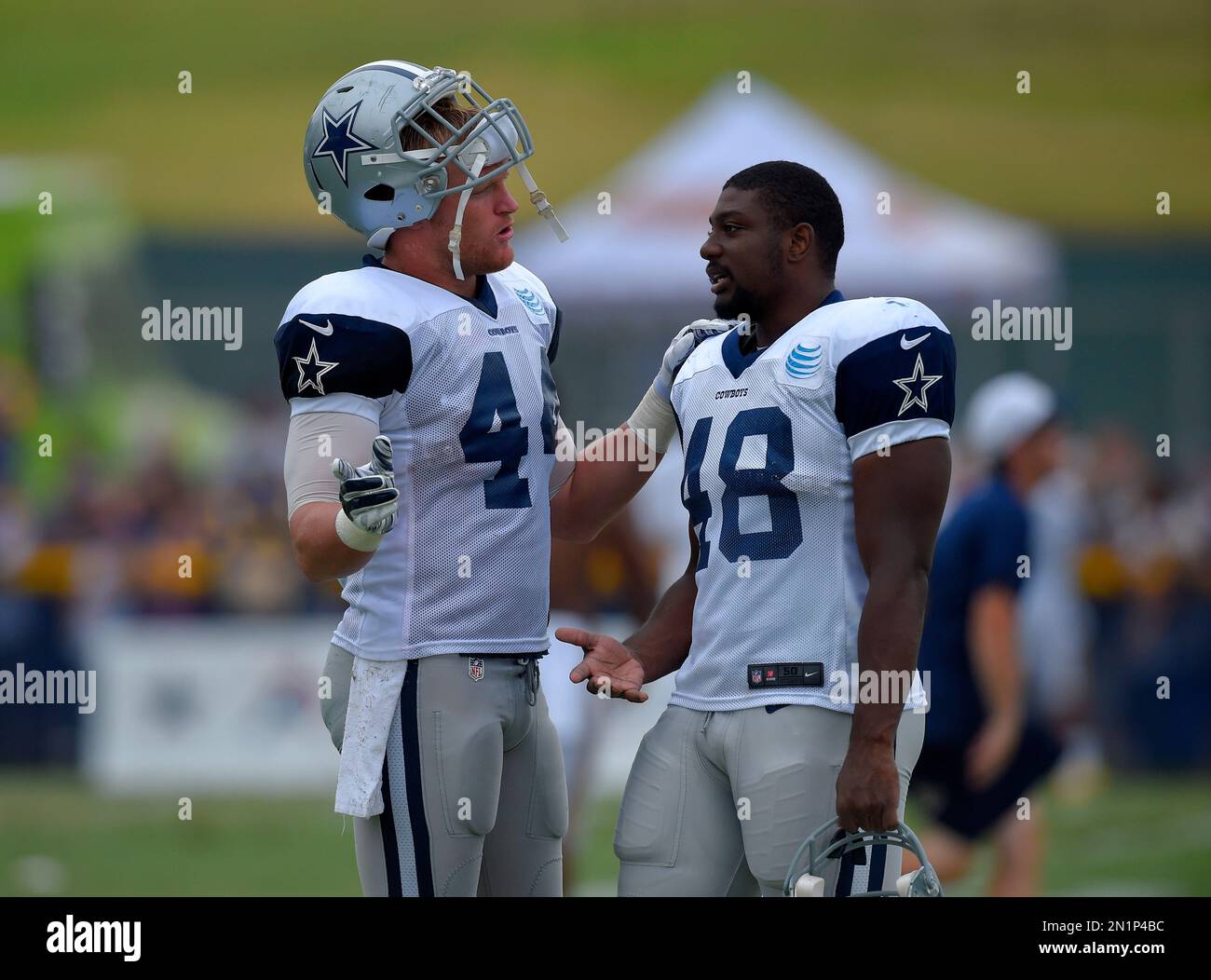 Dallas Cowboys fullback Tyler Clutts, left, talks with running back Ray ...