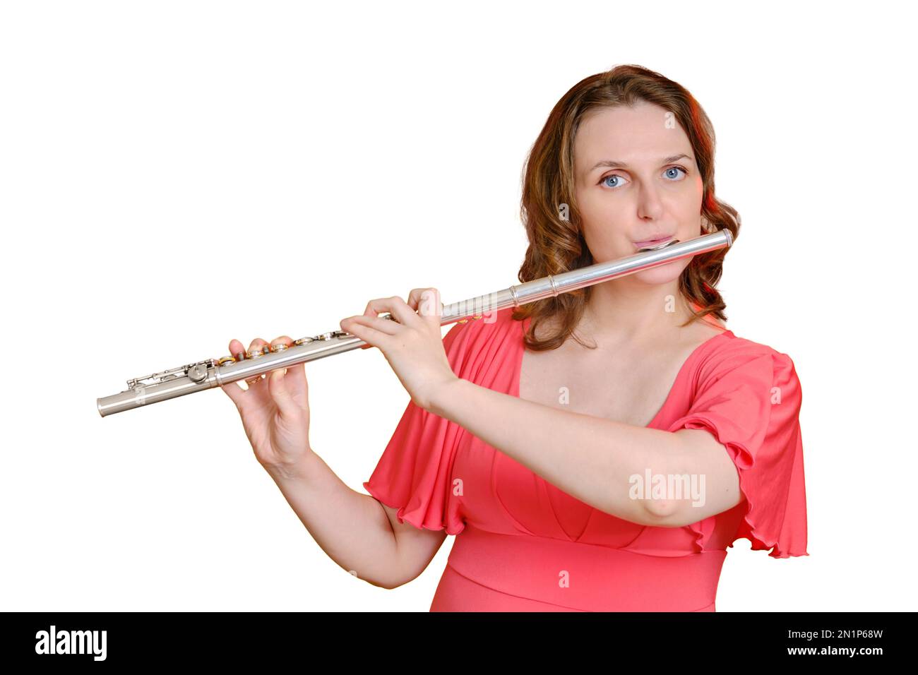 Portrait of a woman musician with a flute on a studio isolated white ...