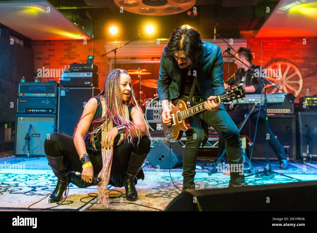 Debby Holiday, left, and Gilby Clarke perform during the "Music On A ...