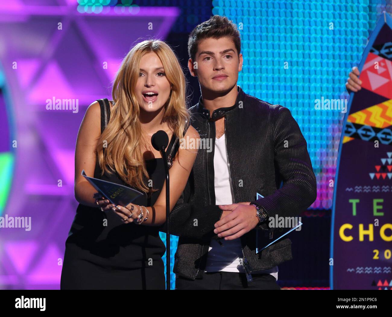 Bella Thorne, left, and Gregg Sulkin present the choice web stars award ...