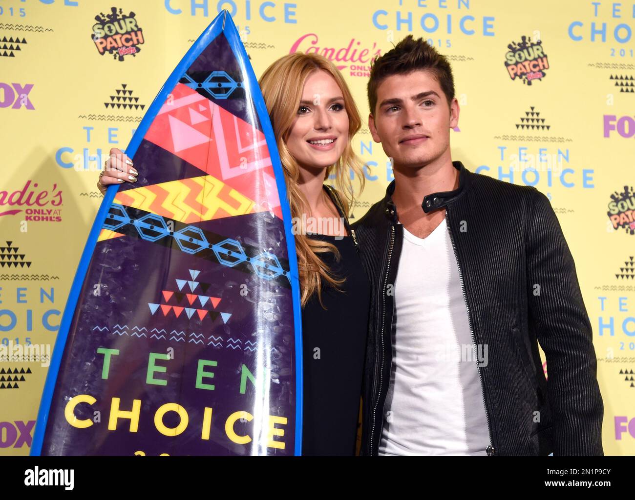 Bella Thorne, left, and Gregg Sulkin pose in the press room at the Teen ...