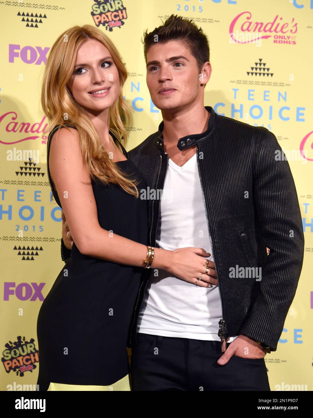 Bella Thorne, left, and Gregg Sulkin pose in the press room at the Teen ...
