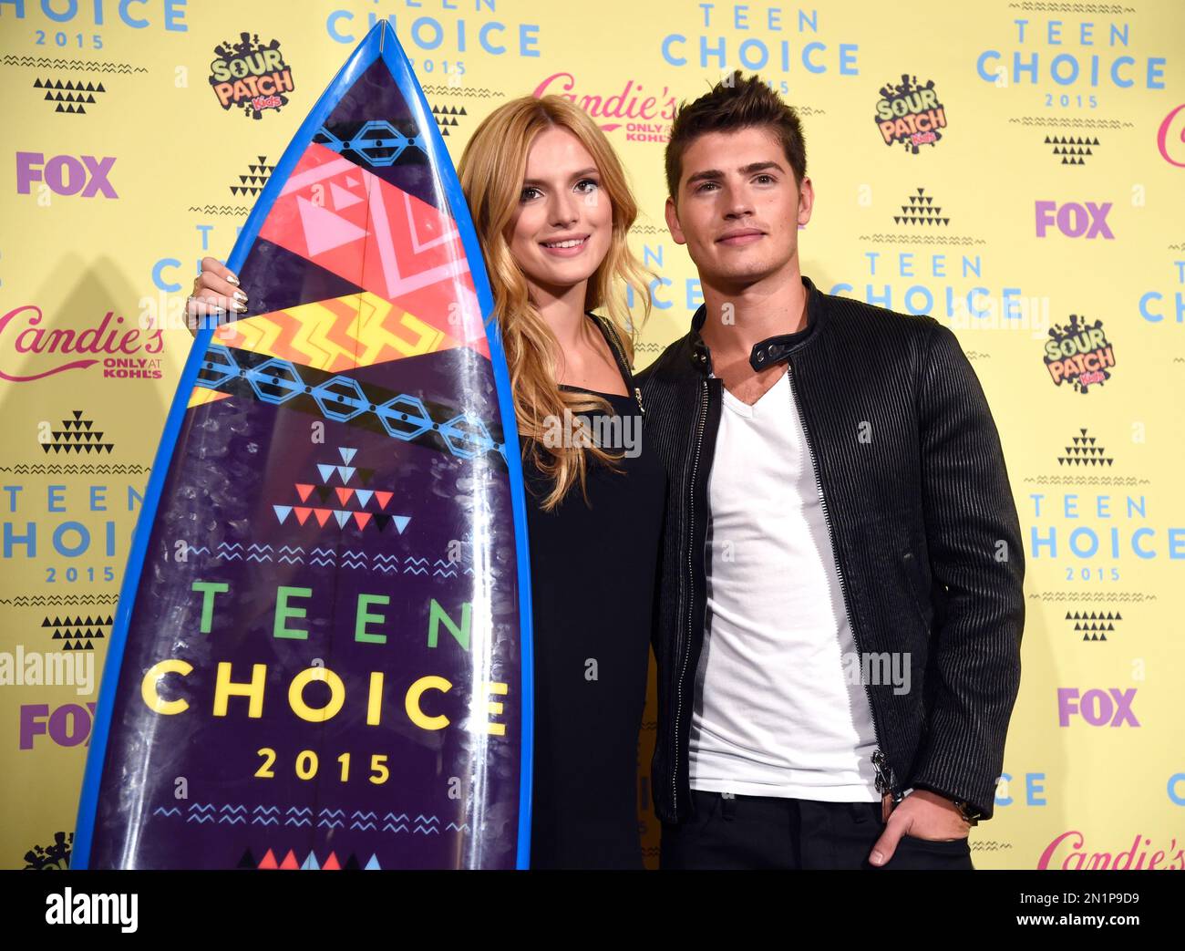 Bella Thorne, left, and Gregg Sulkin pose in the press room at the Teen ...