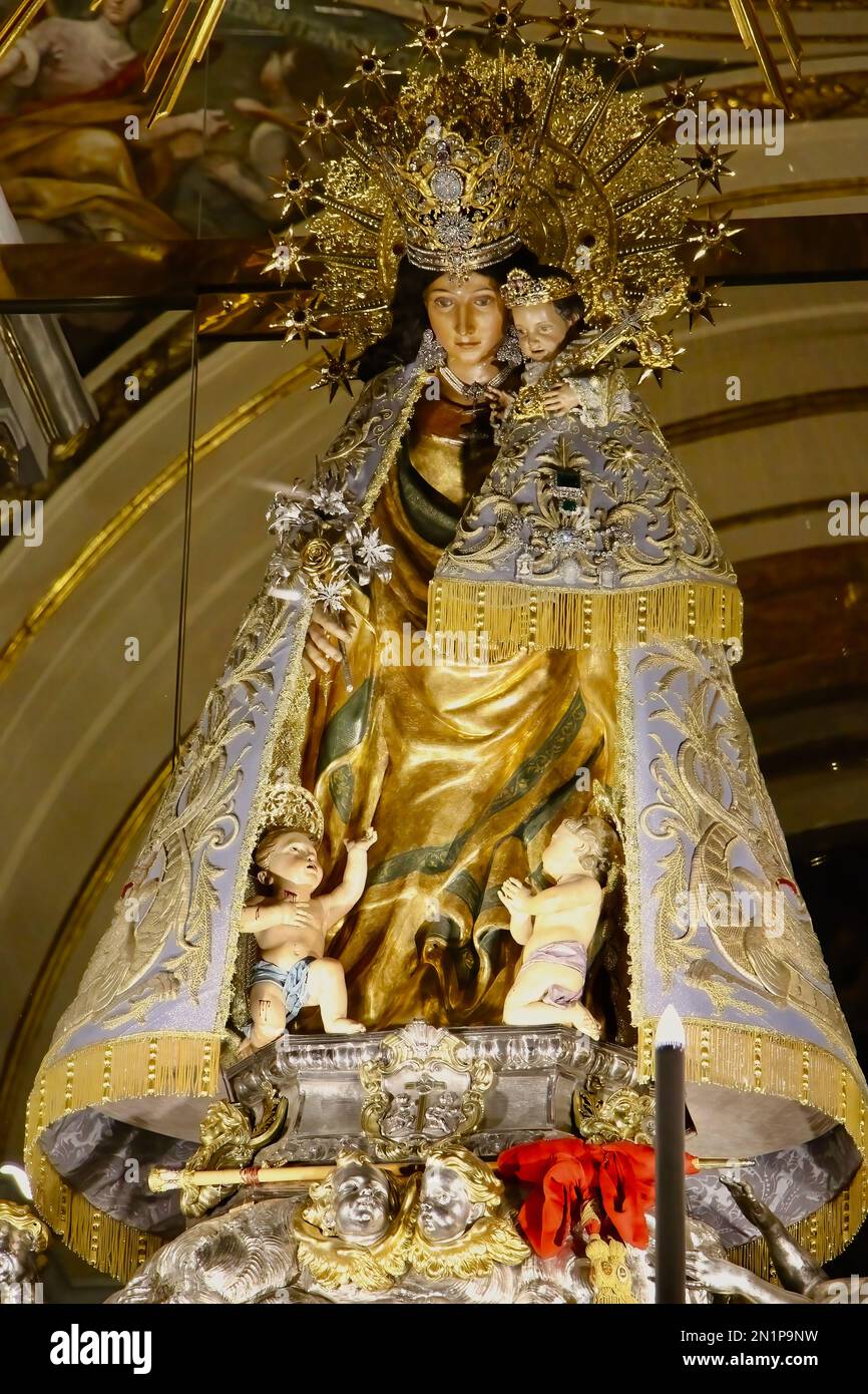 Main altar with madonna and child in the Real Basílica de la Virgen de ...