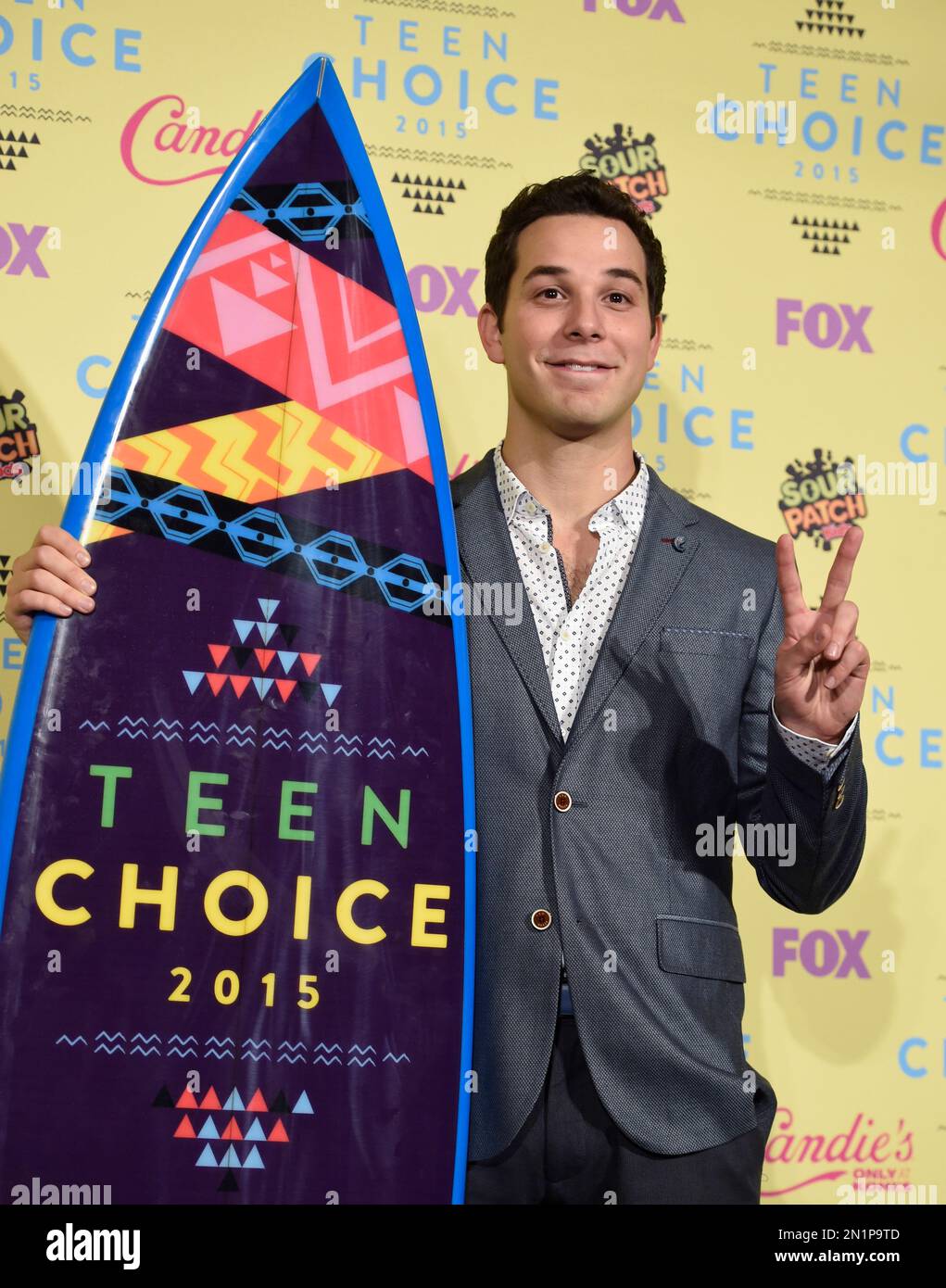 Skylar Astin, winner of the award for choice movie actor: comedy, poses ...