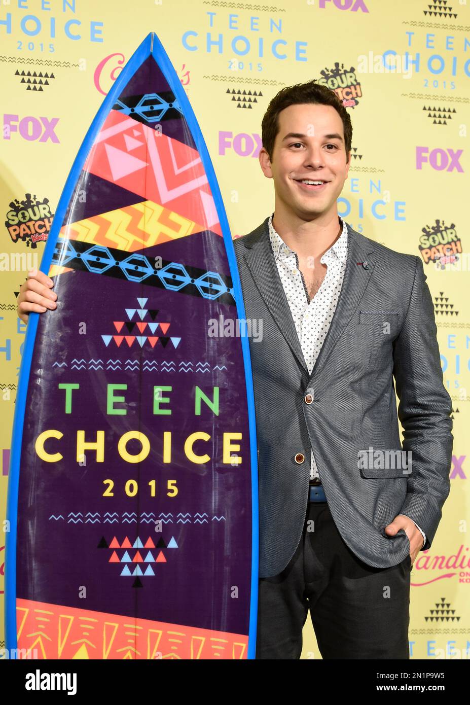 Skylar Astin, winner of the award for choice movie actor: comedy, poses ...