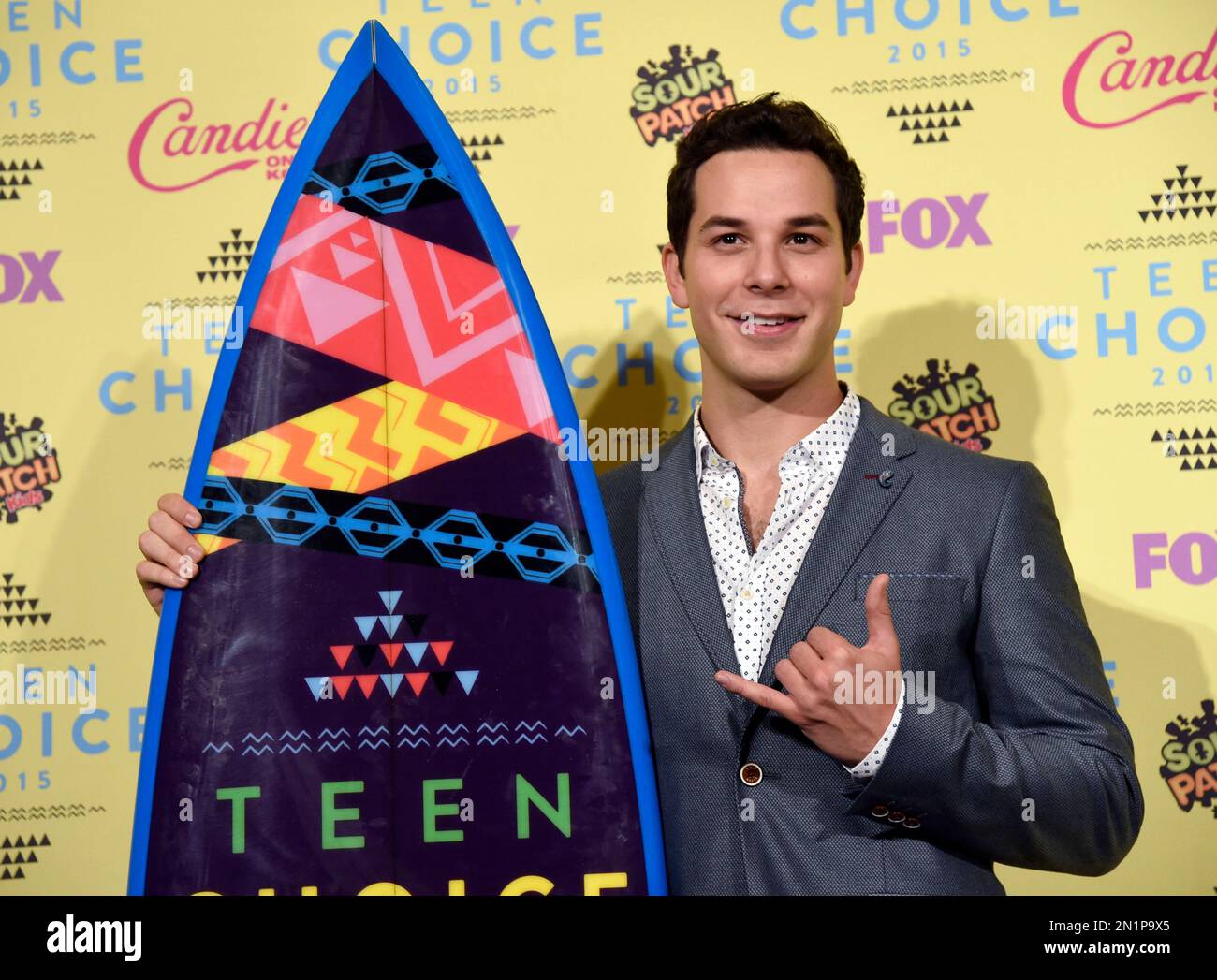 Skylar Astin, winner of the award for choice movie actor: comedy, poses ...