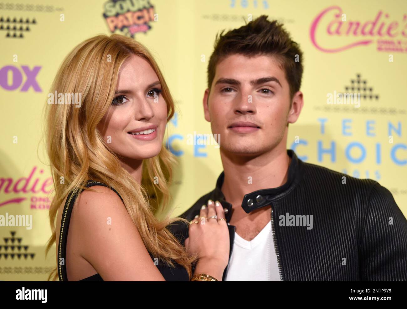 Bella Thorne, left, and Gregg Sulkin pose in the press room at the Teen ...