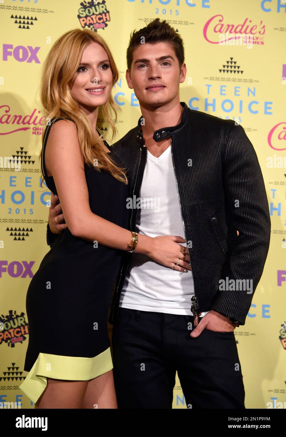 Bella Thorne, left, and Gregg Sulkin pose in the press room at the Teen ...
