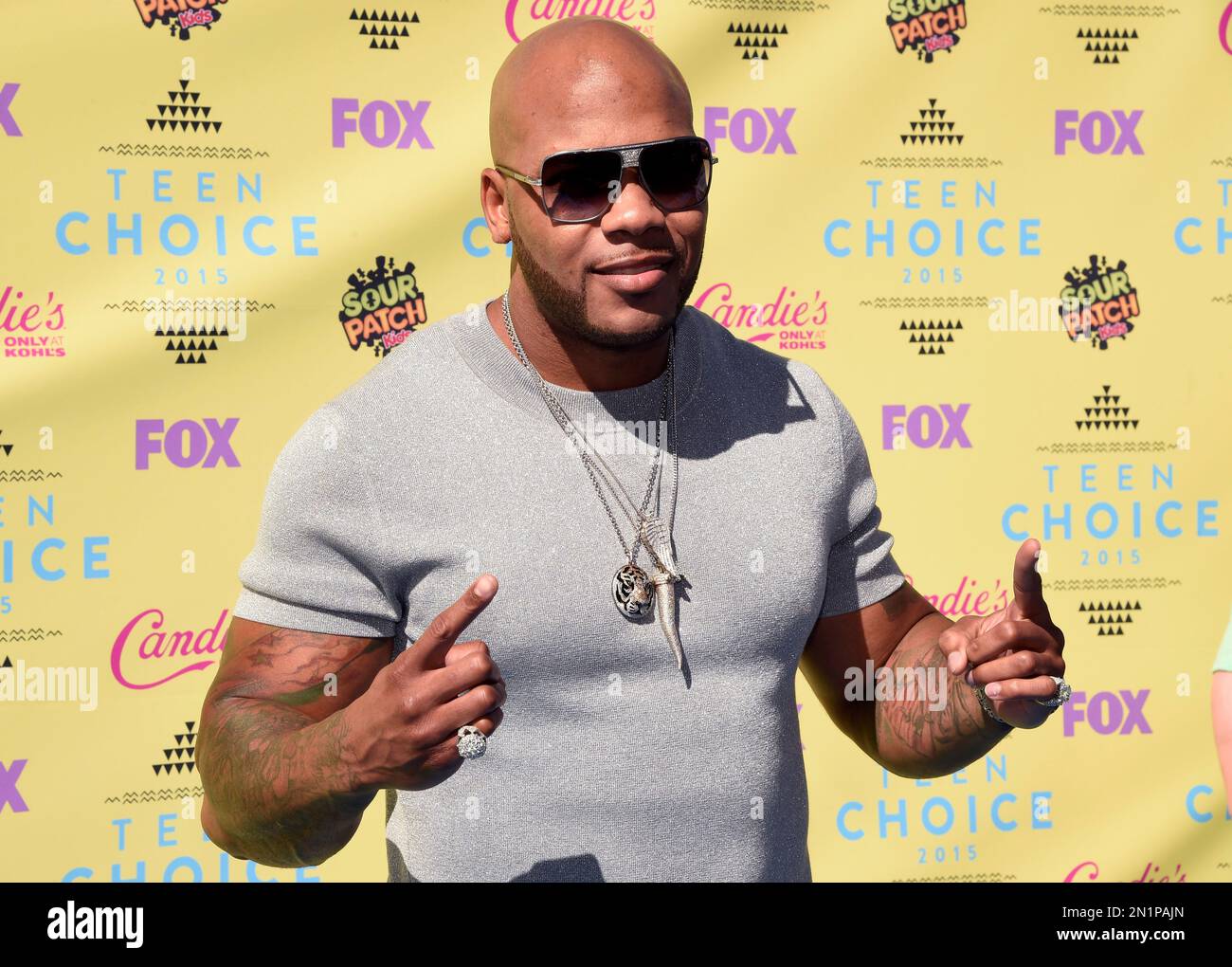 Flo Rida arrives at the Teen Choice Awards at the Galen Center on ...