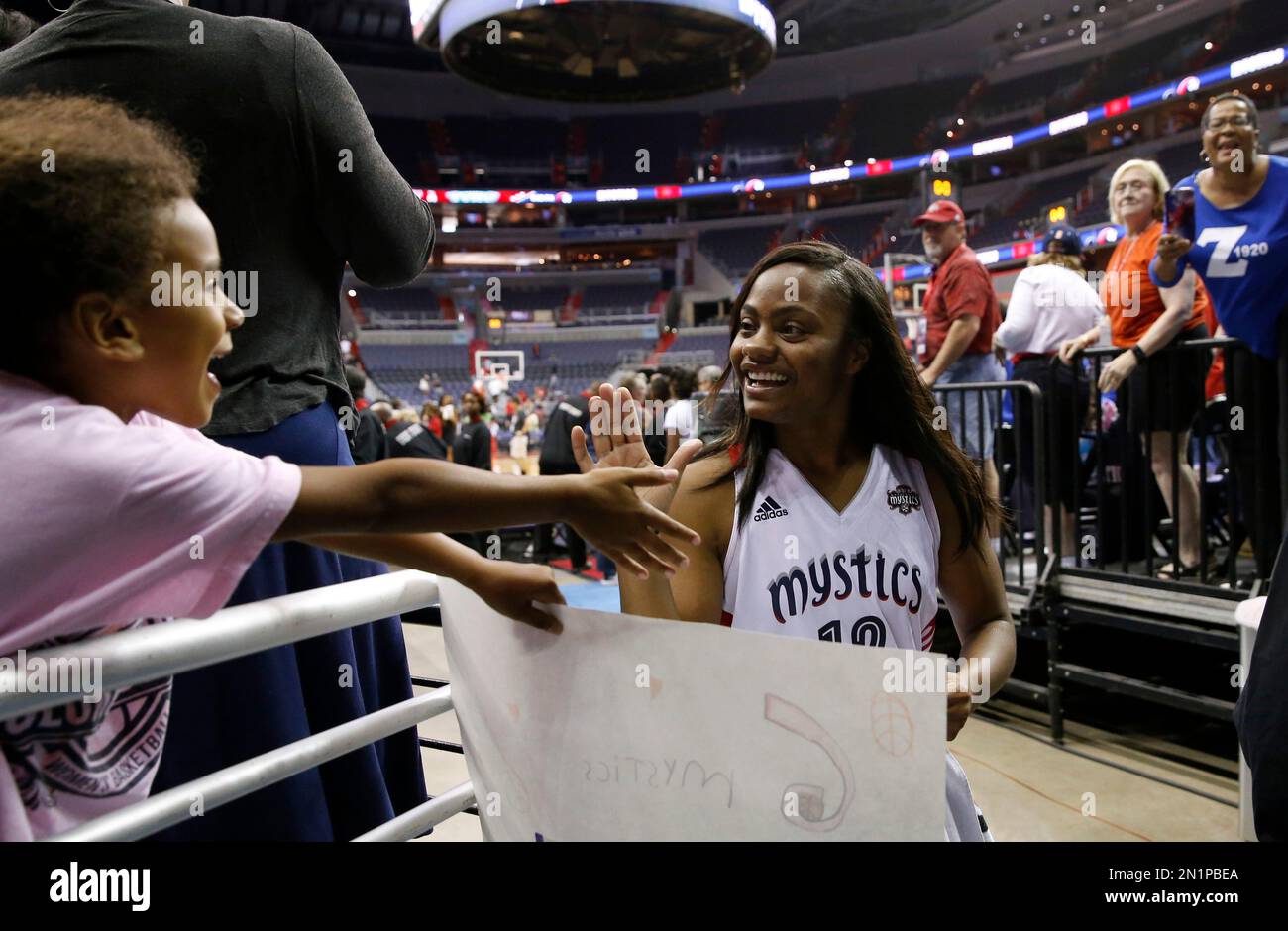 Washington Mystics guard Ivory Latta greets fans after a WNBA ...