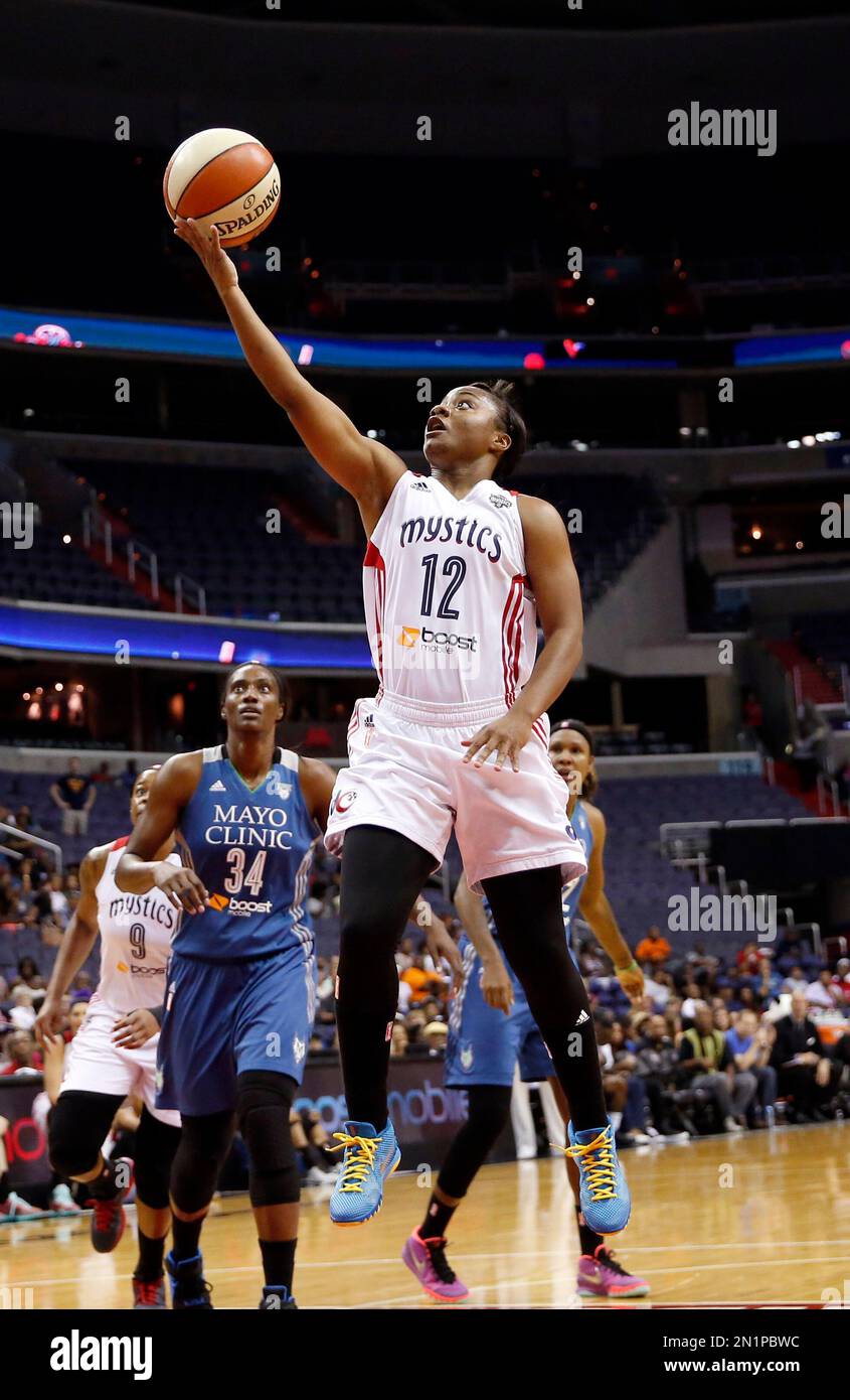 Washington Mystics guard Ivory Latta (12) shoots in front of Minnesota ...