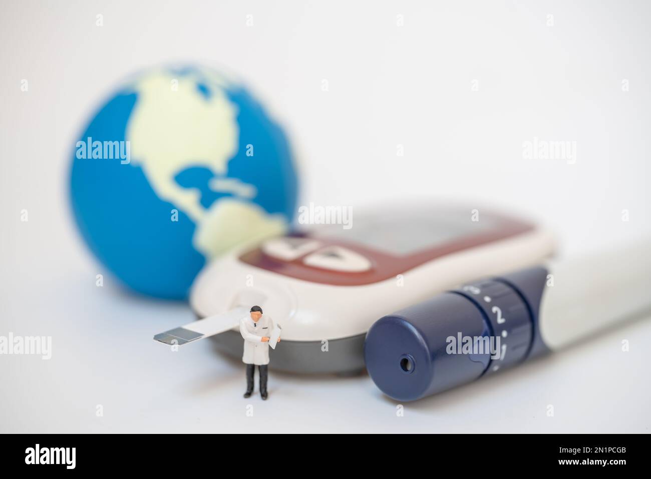 Doctor miniature figure with Patient file standing with lancet, glucose ...