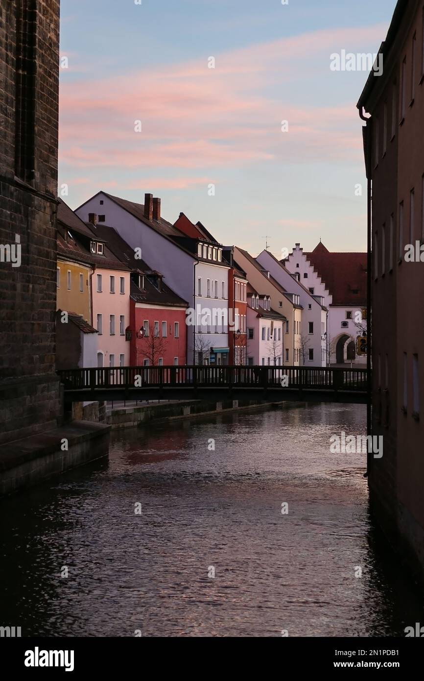 Colorful historical houses on the river in the city of Munich, Germany ...