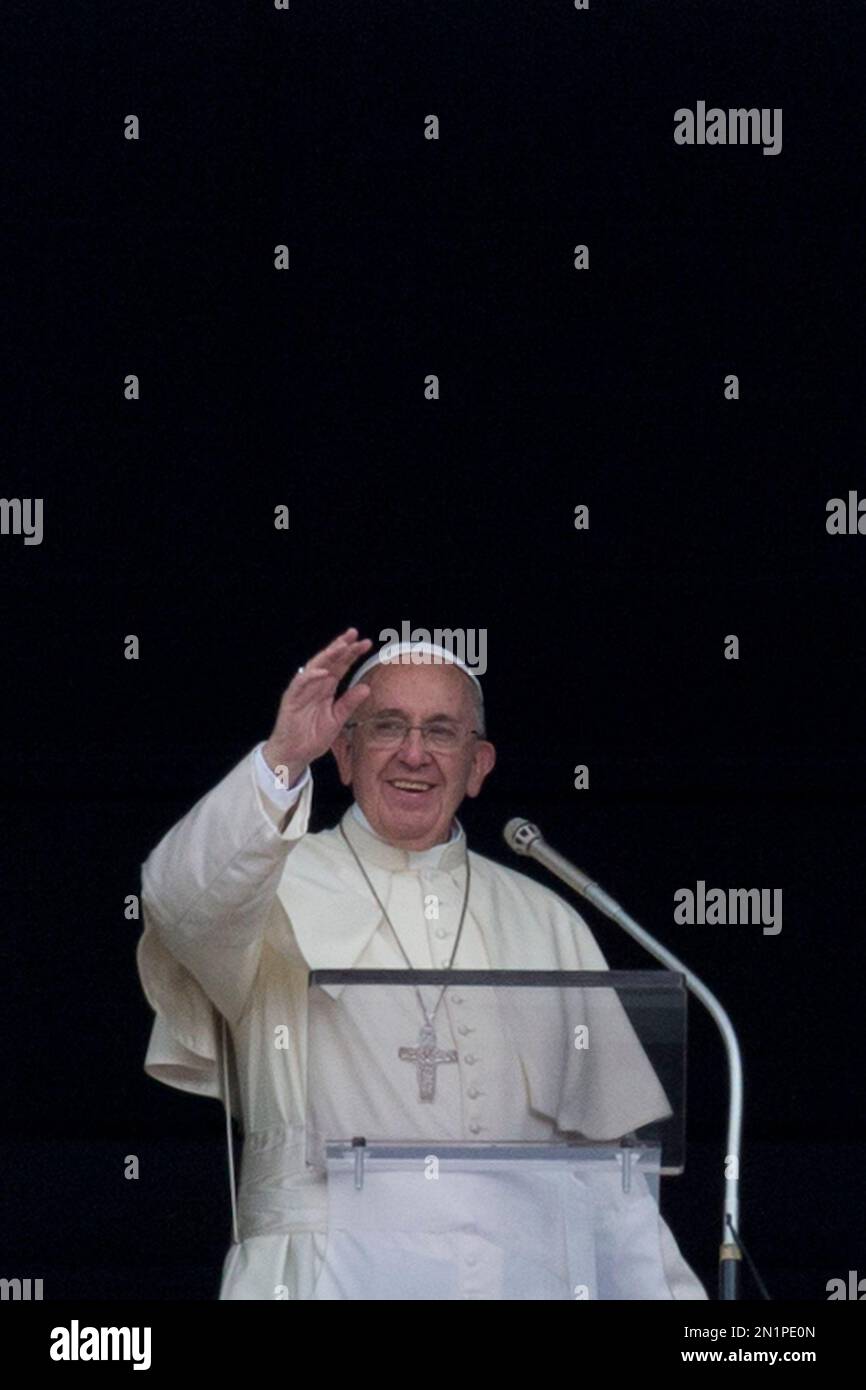 Pope Francis delivers his blessing from the window of his studio ...