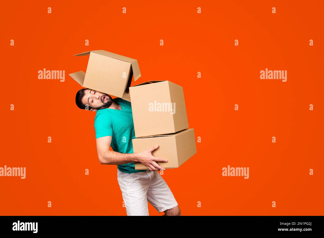 Delivery man falling stack boxes hi-res stock photography and images ...