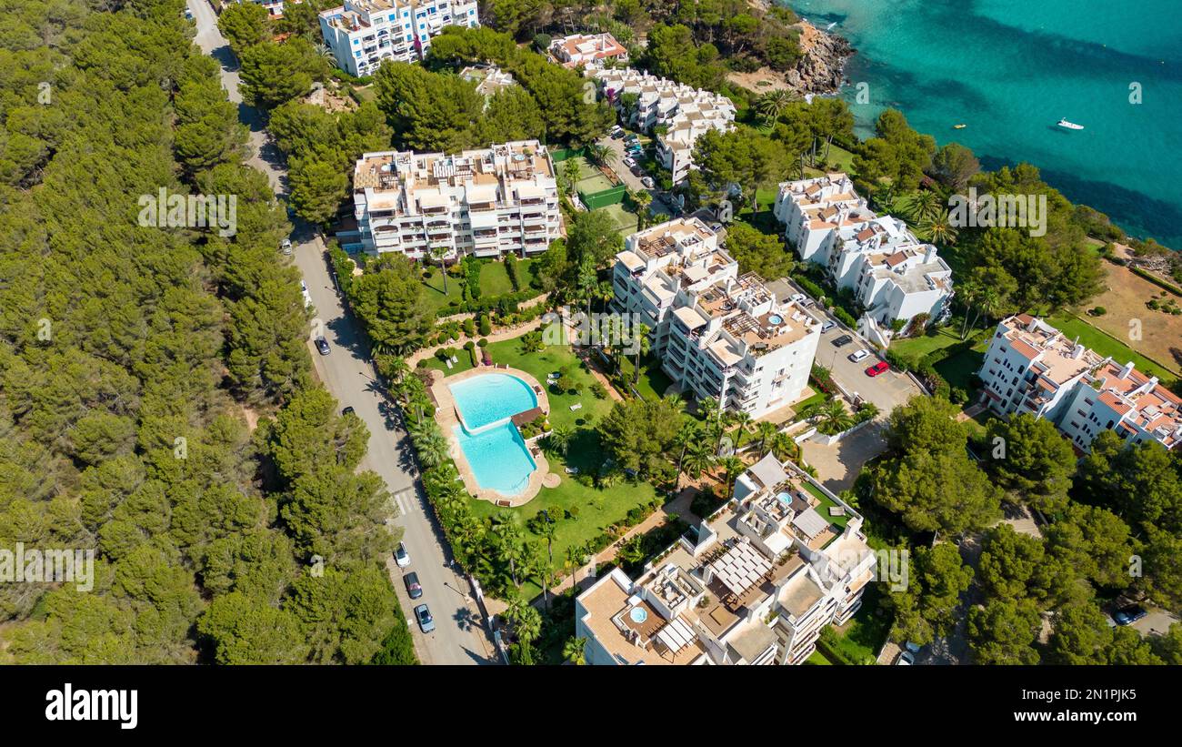 Aerial view of the hotels and beach at the holiday resort of Cala ...