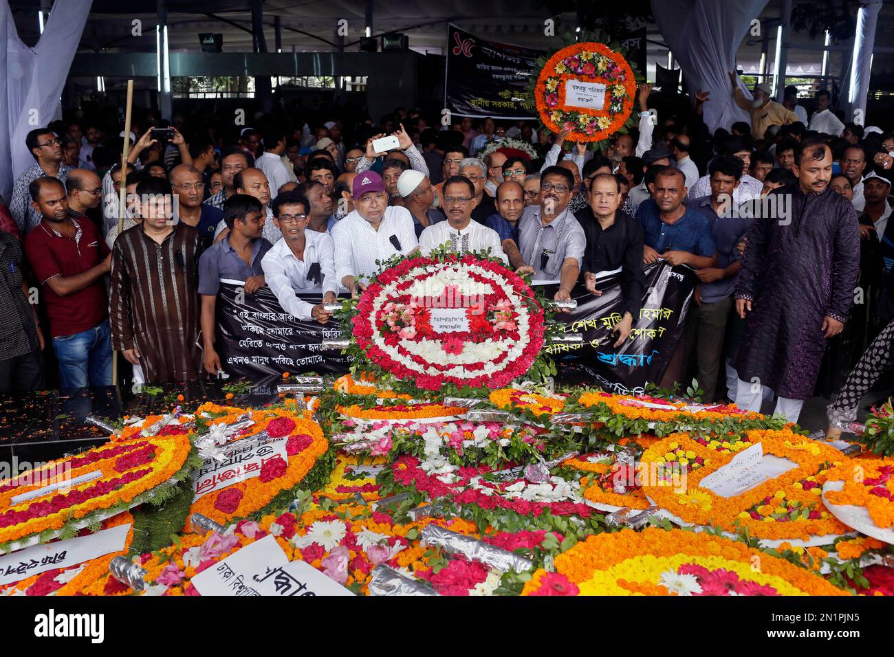 Bangladeshi political activists offer floral tribute at the memorial of ...