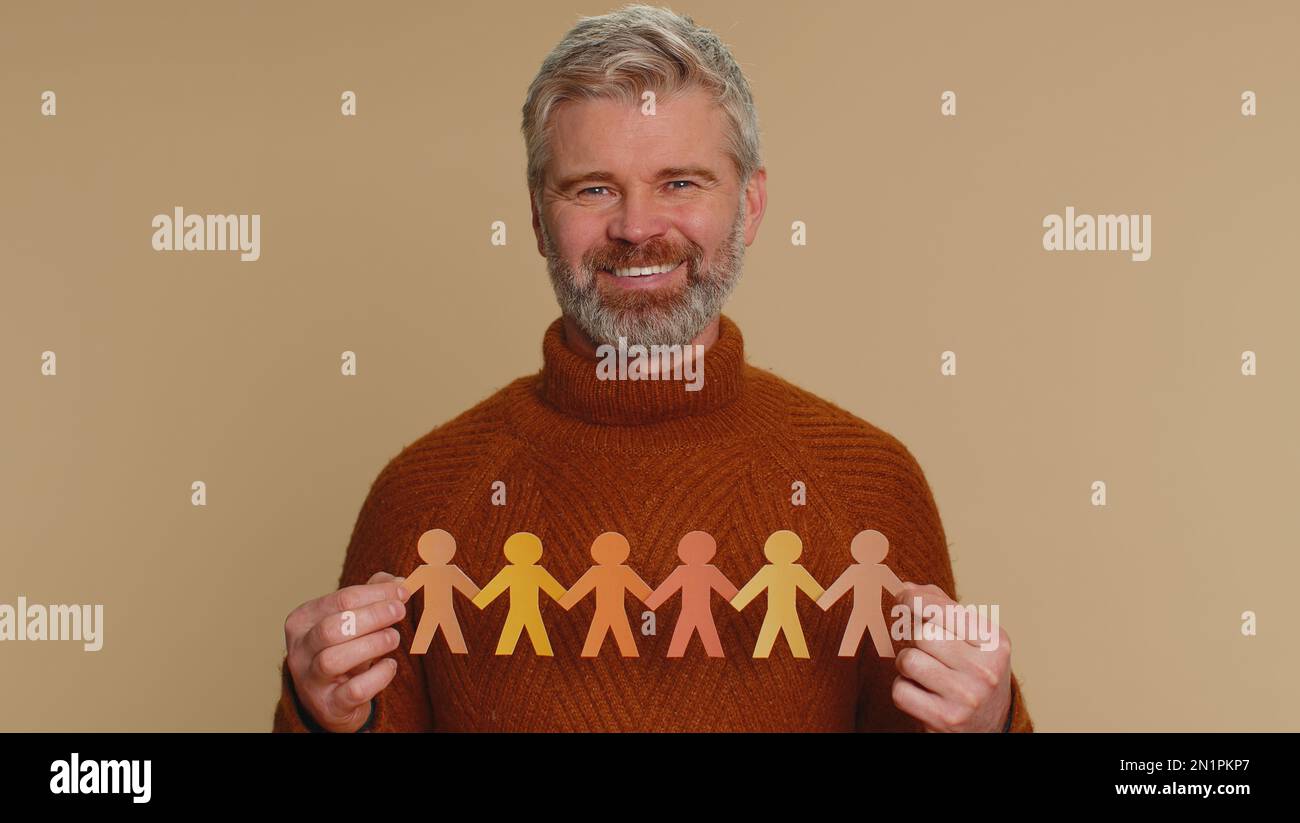 Man showing multiracial different skin color human shape cut out of ...