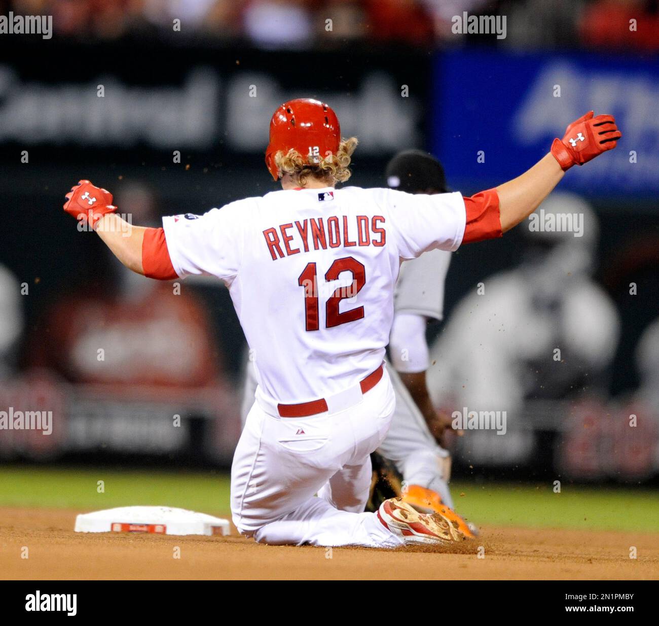 St. Louis Cardinals' Mark Reynolds (12) slides into second with a ...