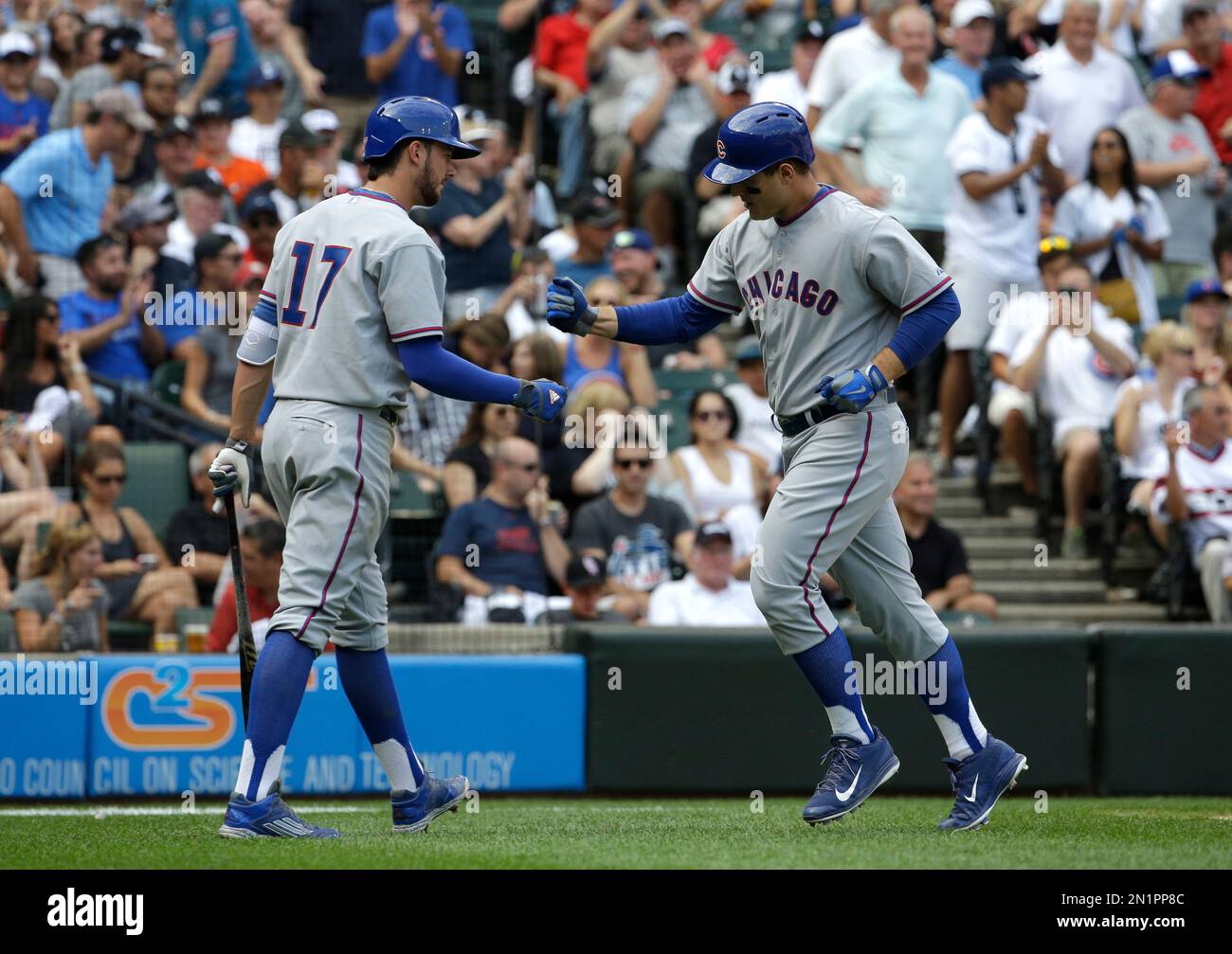 Chicago Cubs' Anthony Rizzo, right, celebrates with Kris Bryant after ...