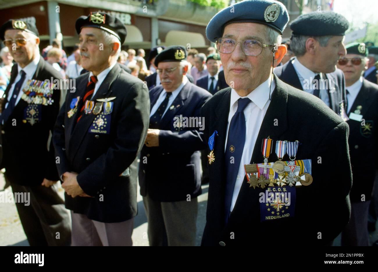 Netherlands, Wageningen. World War II veterans in a parade the 5th of ...