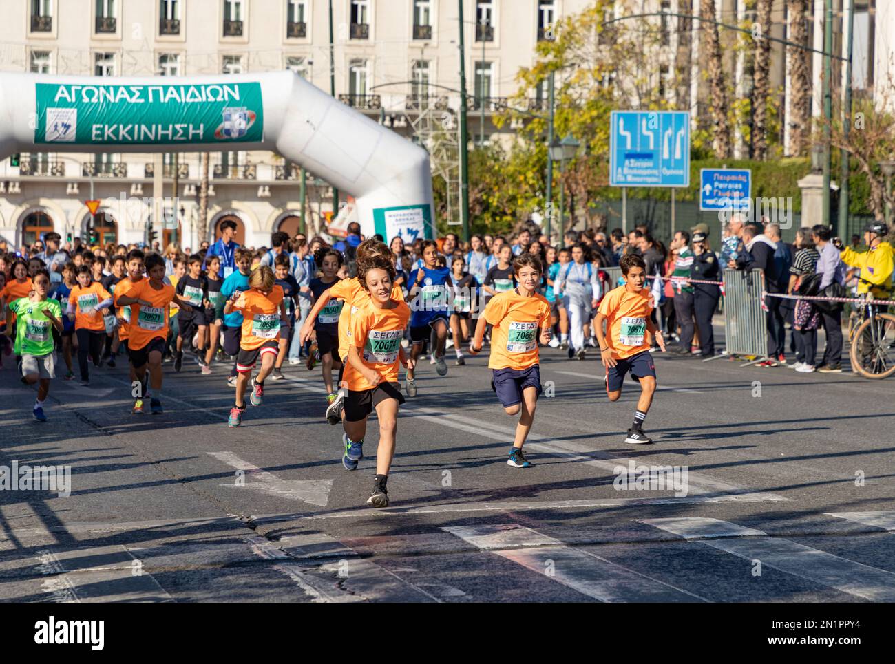 A picture of children running on the 1.2km Kids Race, part of the ...