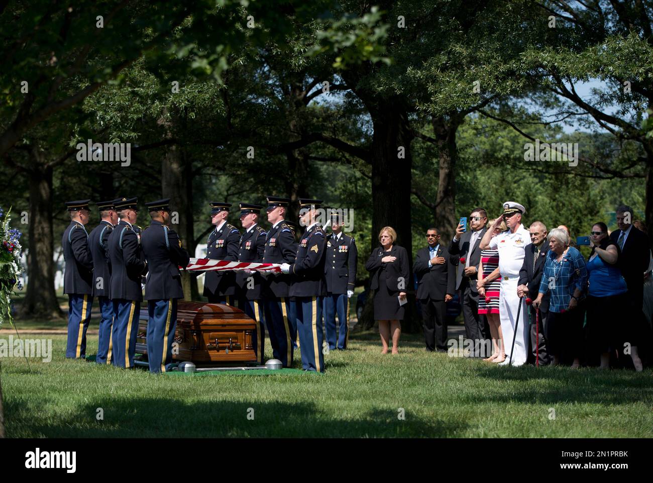 The flag is lifted from the casket of U.S. Army Air Force 2nd Lt ...